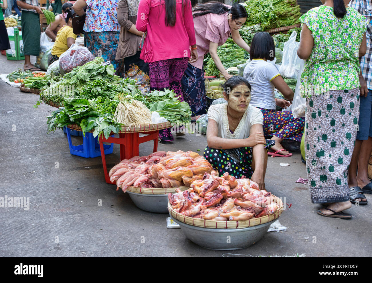 Chicken seller at the Thiri Mingala Market in Yangon, Myanmar Stock ...