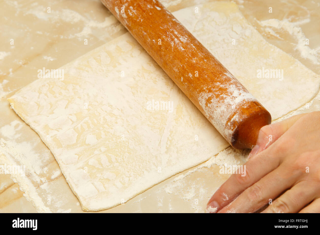 Baking sweet cakes process of dough closeup Stock Photo - Alamy