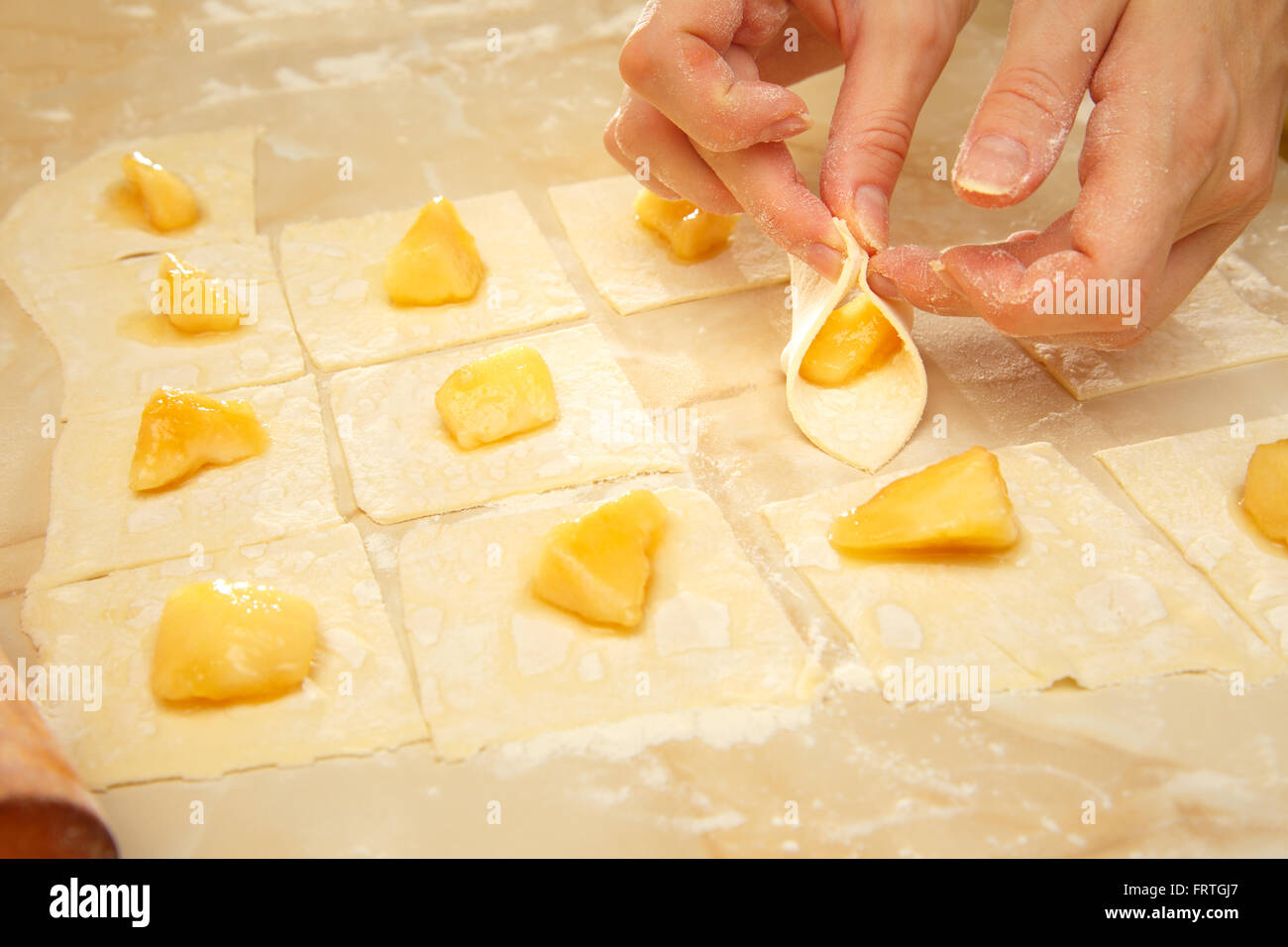 Baking sweet cakes process of dough closeup Stock Photo - Alamy