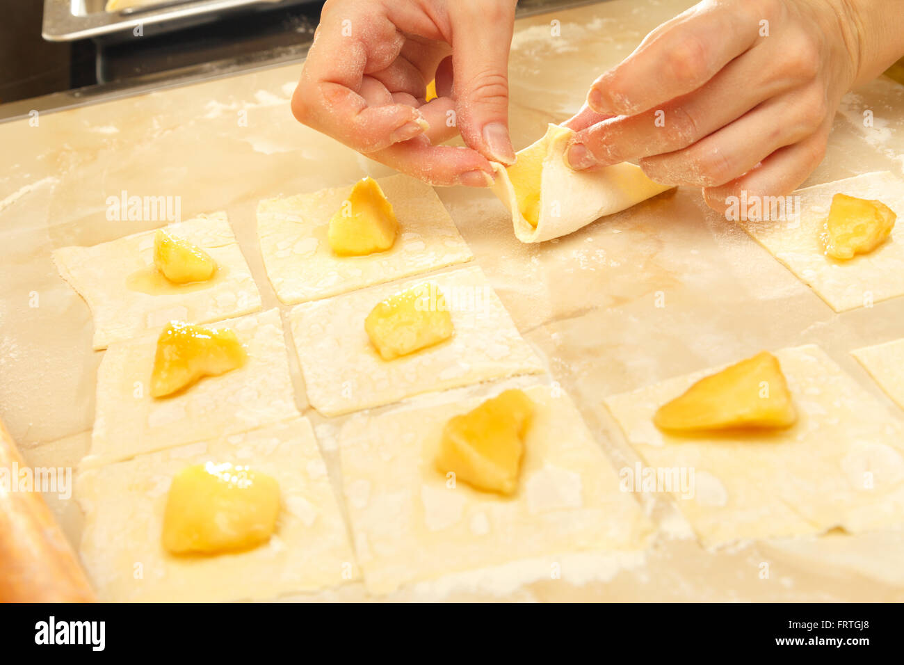 Baking sweet cakes process of dough closeup Stock Photo - Alamy
