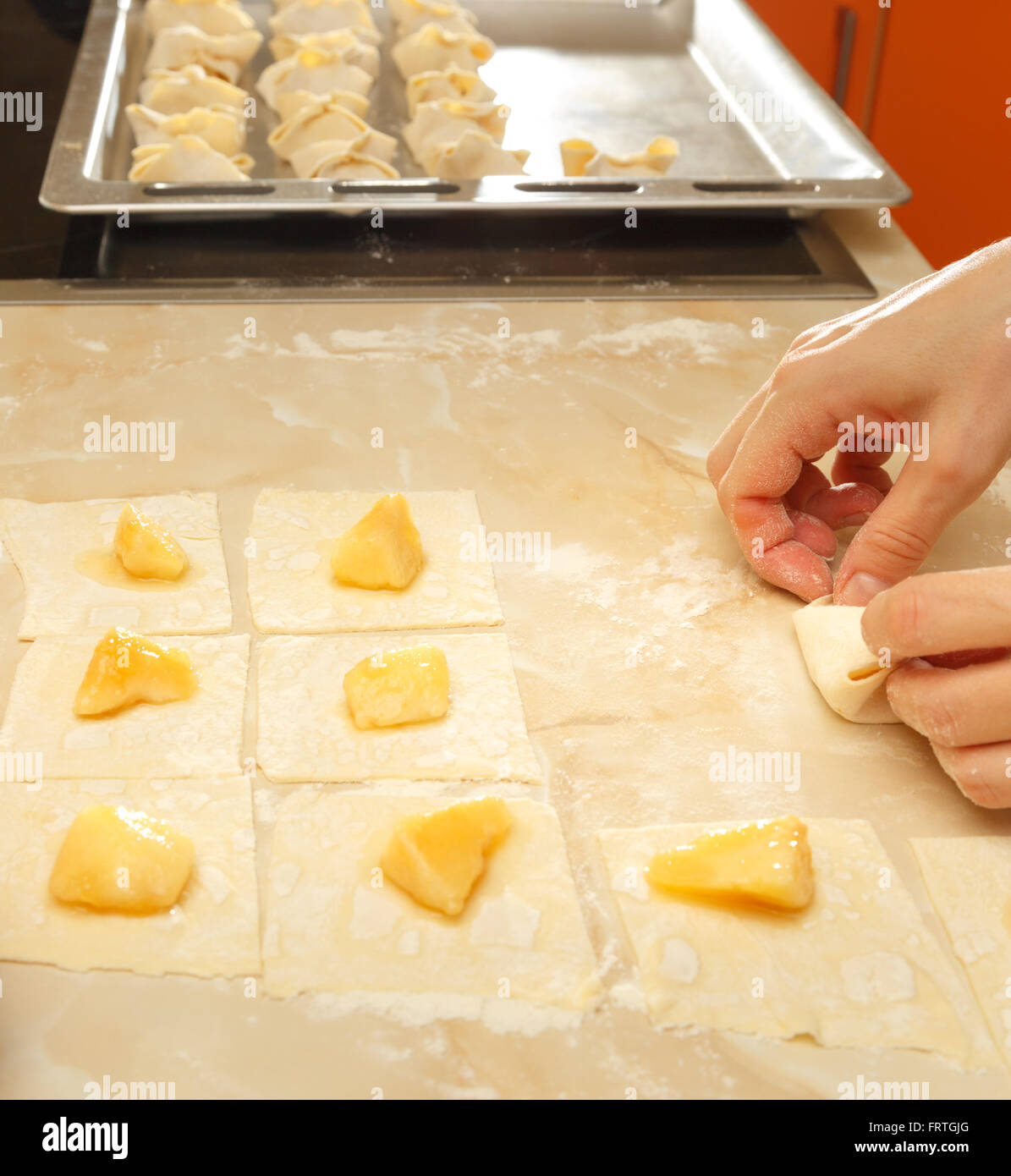 Baking sweet cakes process of dough closeup Stock Photo - Alamy