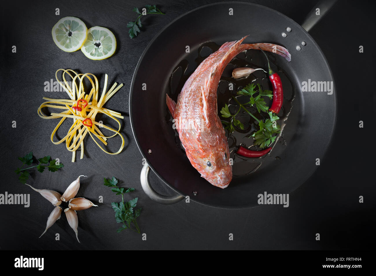 Cooking Fettuccine With Scorpionfish Stock Photo - Alamy