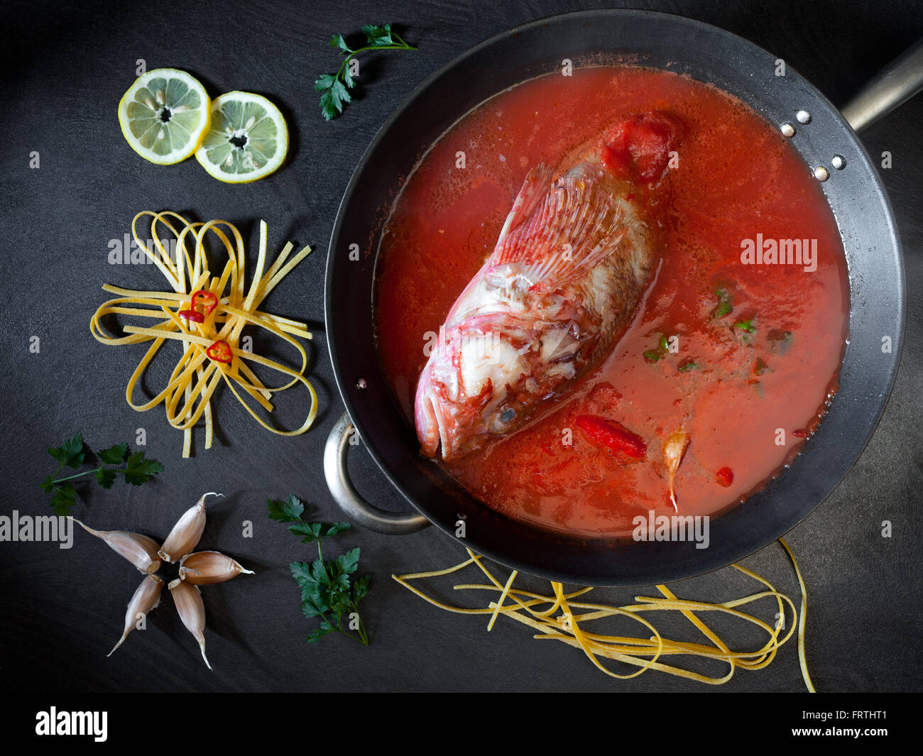 Sorpionfish Tomato Sauce Stock Photo - Alamy