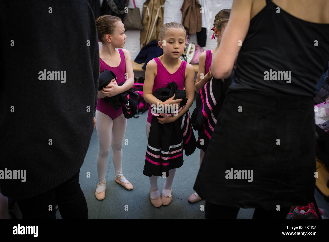 Girls wait in the dressing room just before their grade 1 ballet ...