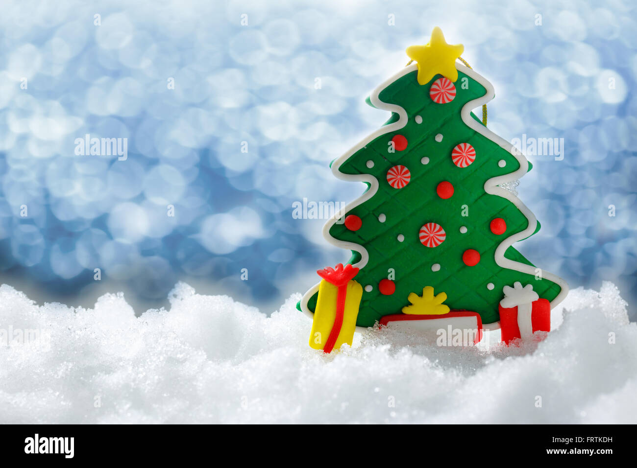 Christmas decorative tree for design on snow background Stock Photo - Alamy