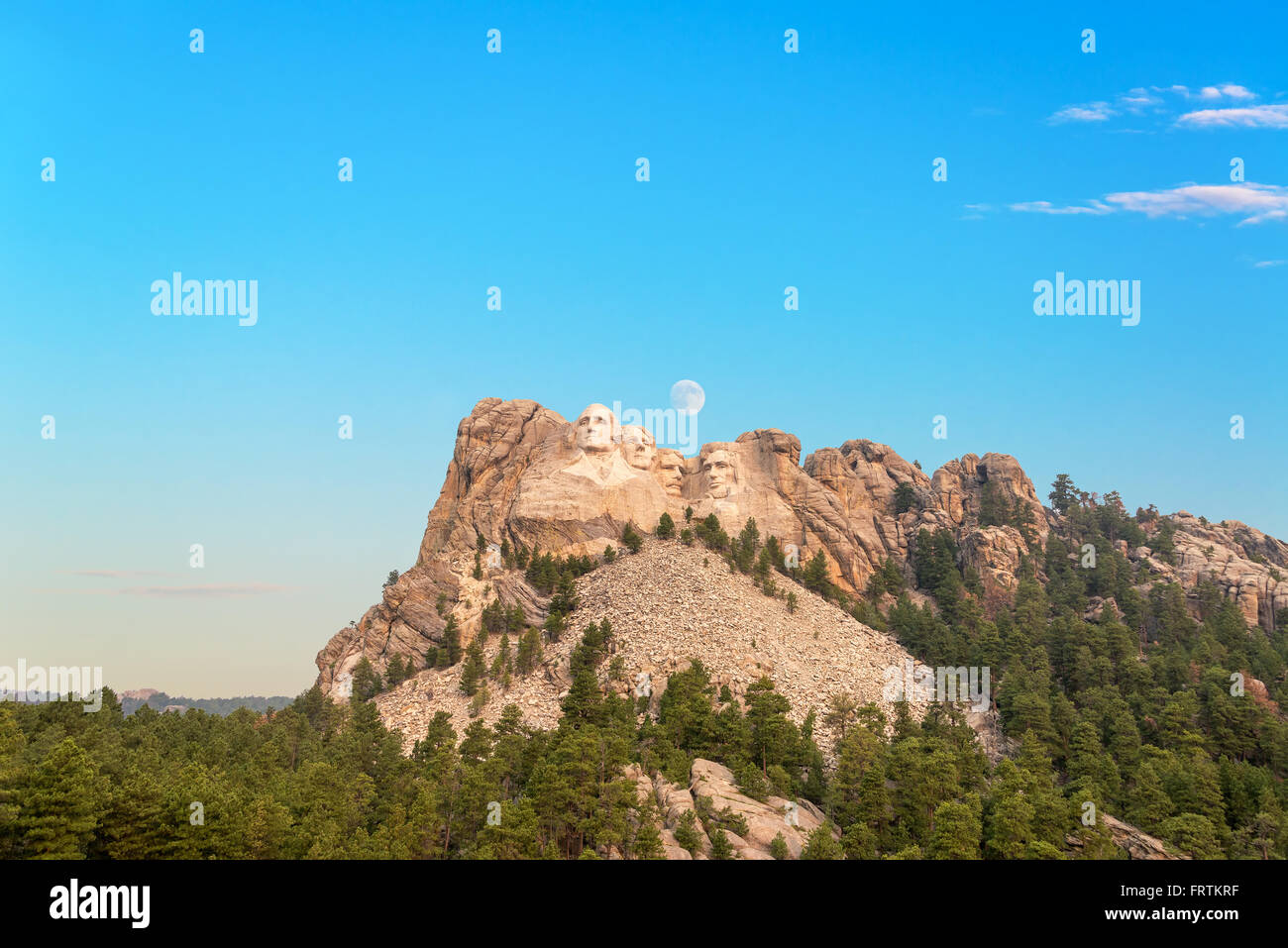 Mount Rushmore with the moon visible near Keystone, South Dakota Stock ...