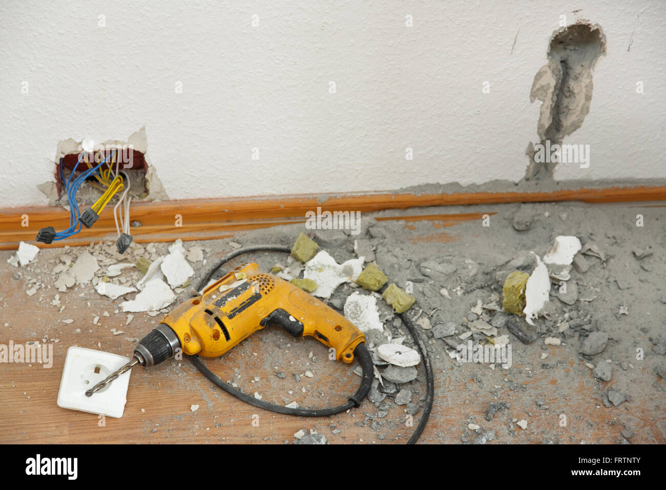 Place of electric socket repair process with drill Stock Photo - Alamy