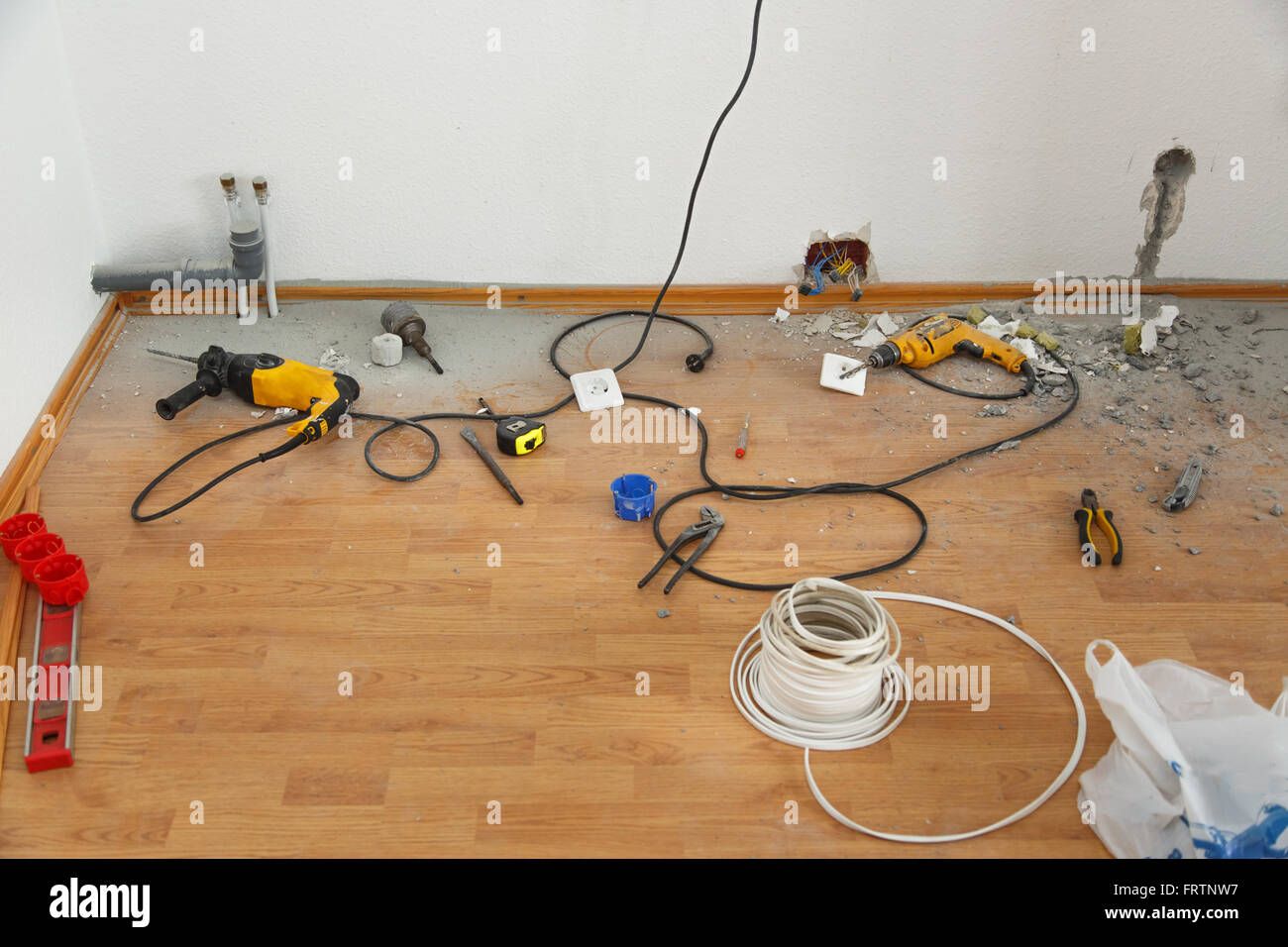 Place of electric socket repair process with drill Stock Photo - Alamy