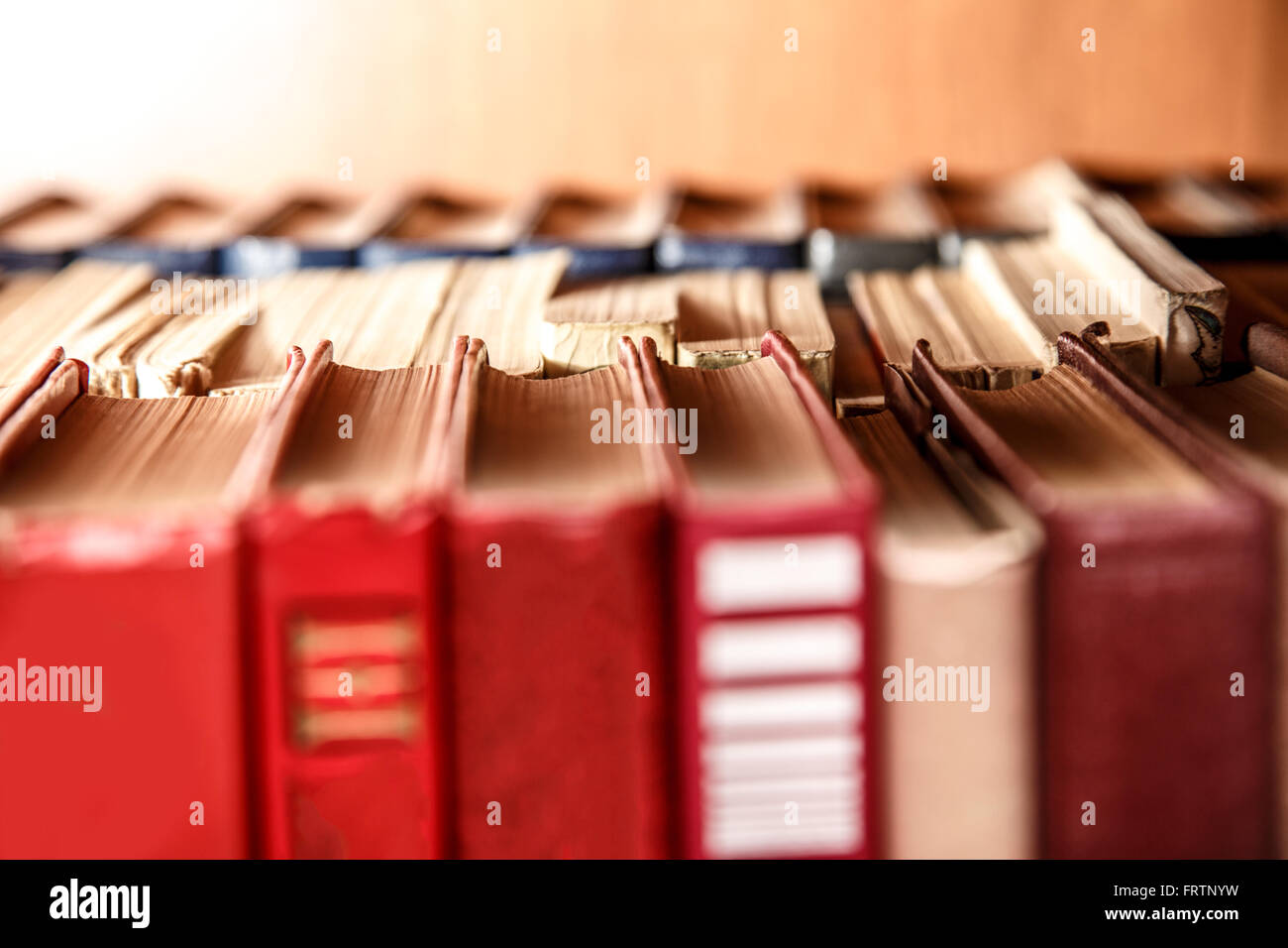 Old books on shelf in the Library Stock Photo - Alamy