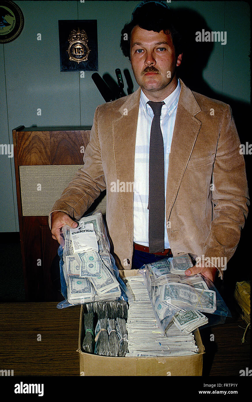 Chicago, Illinois, USA, 18th May, 1987 DEA agents display cash guns and ...
