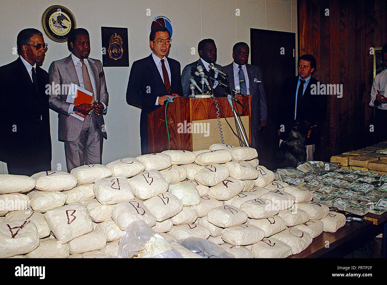 Chicago, Illinois, USA, 18th May, 1987 DEA agents display cash guns and ...