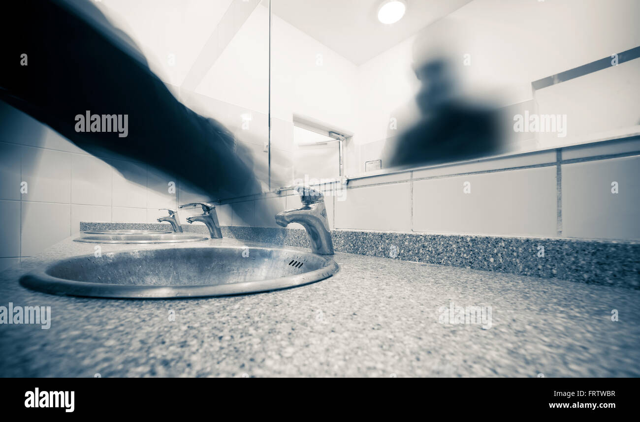 man silhouette in water closet Stock Photo - Alamy