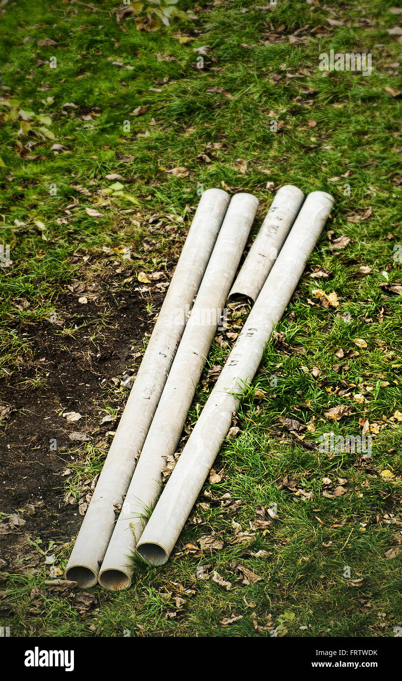 new concrete pipes on ground Stock Photo - Alamy
