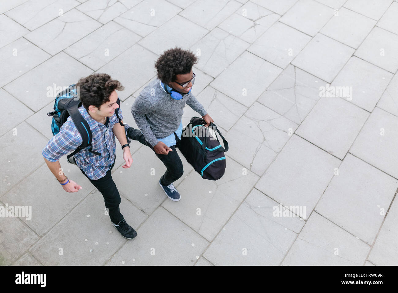 Two best friends running side by side Stock Photo - Alamy
