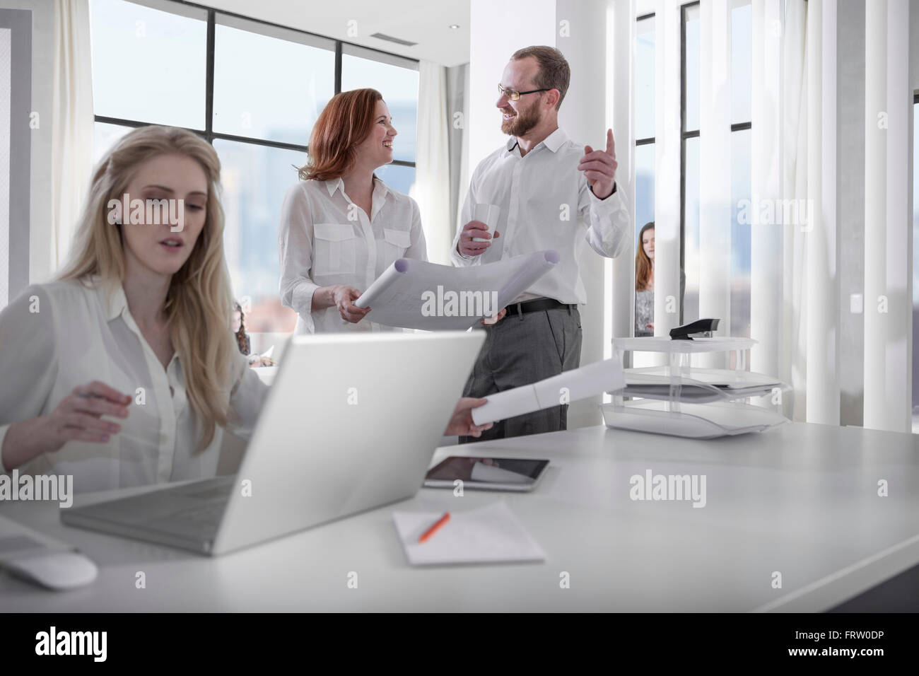People at work in office Stock Photo - Alamy