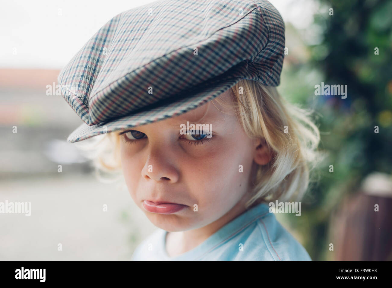 Defiant facial expression hi-res stock photography and images - Alamy