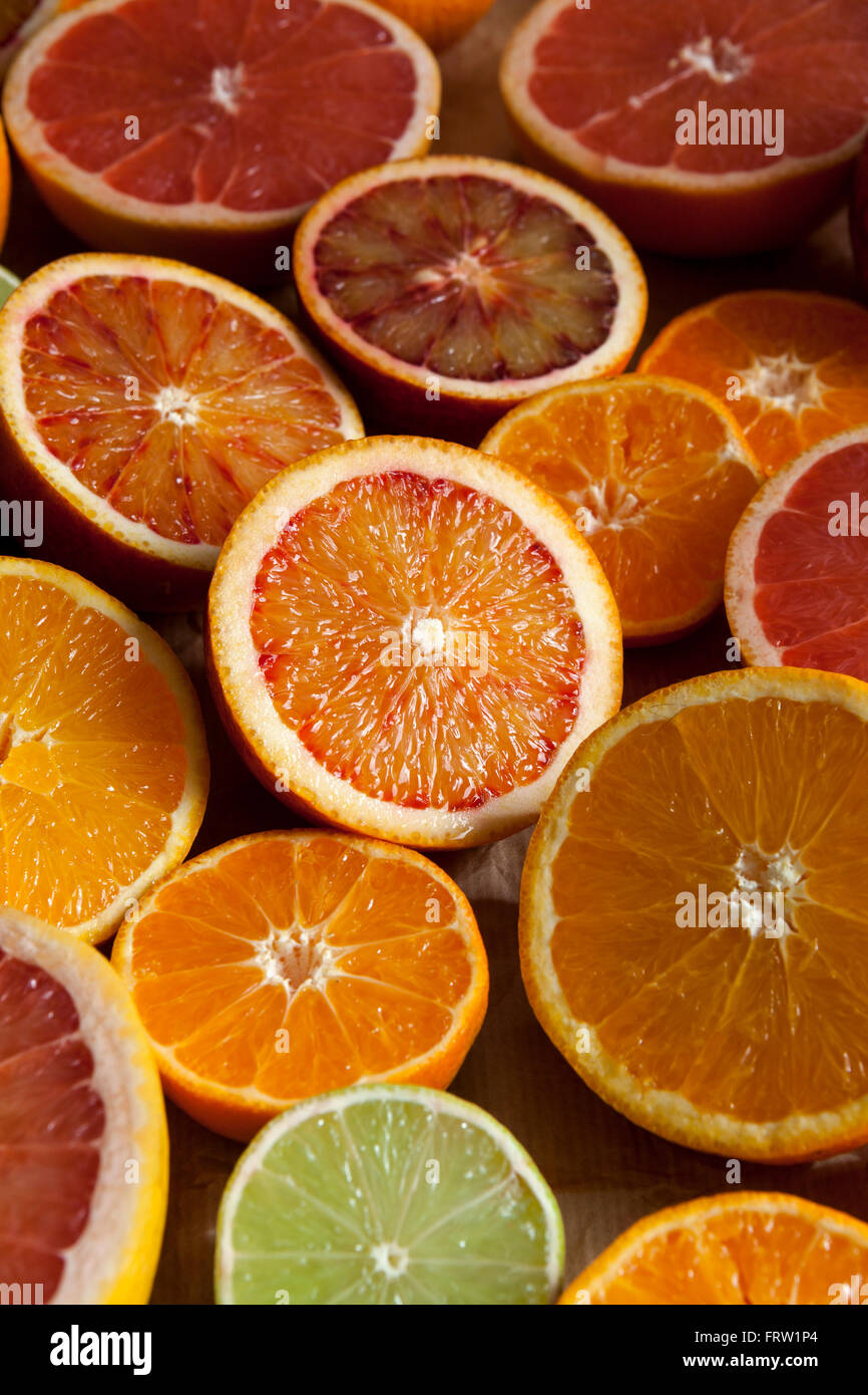 Halves of different citrus fruits Stock Photo - Alamy