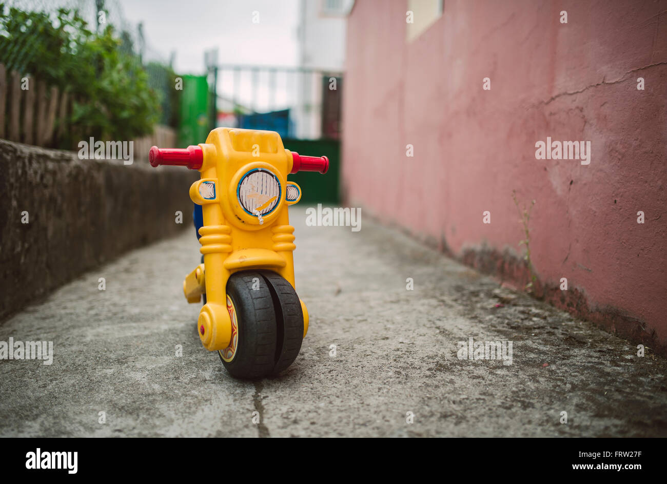Yellow toy motorbike Stock Photo - Alamy