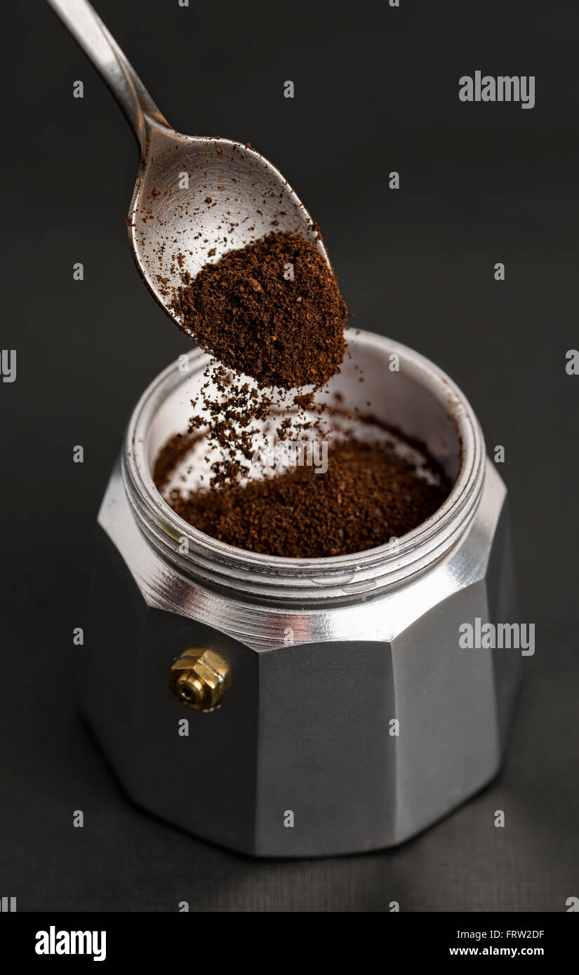 Filling an Italian espresso can Stock Photo - Alamy