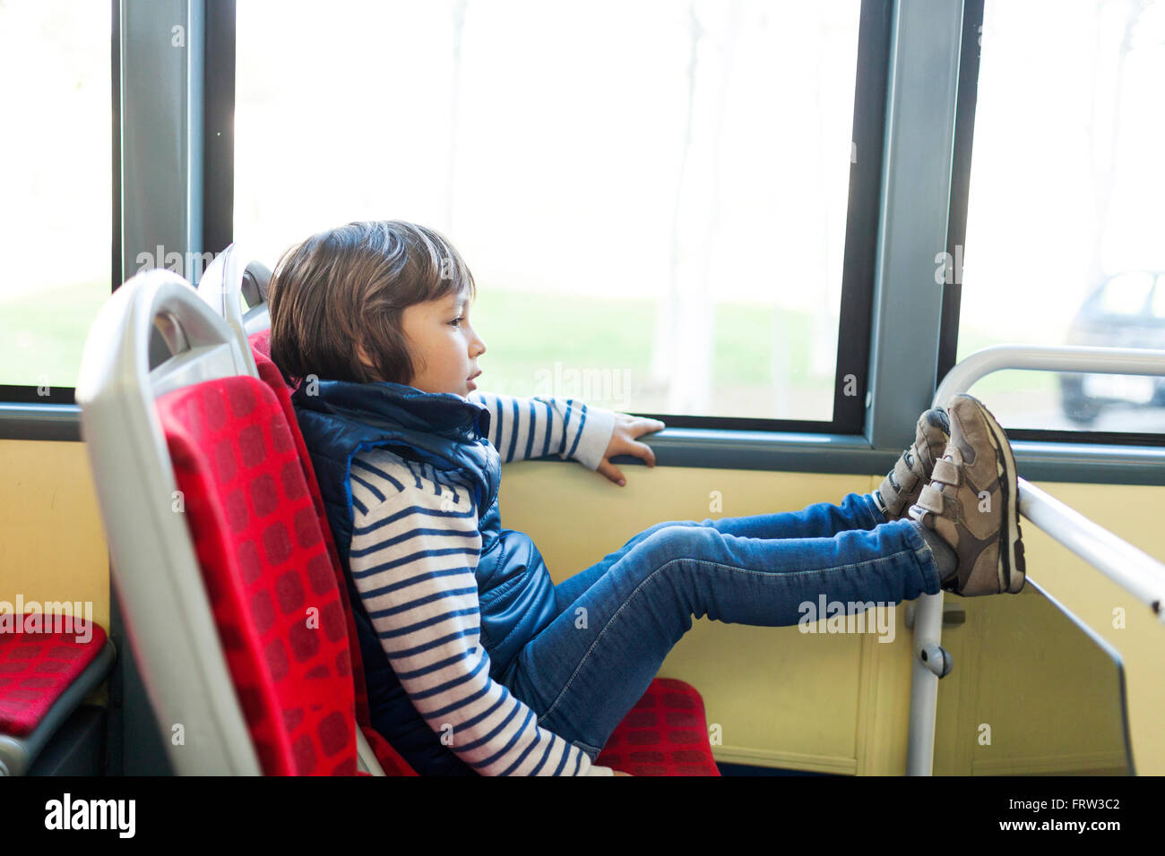 Little boy going by bus Stock Photo - Alamy