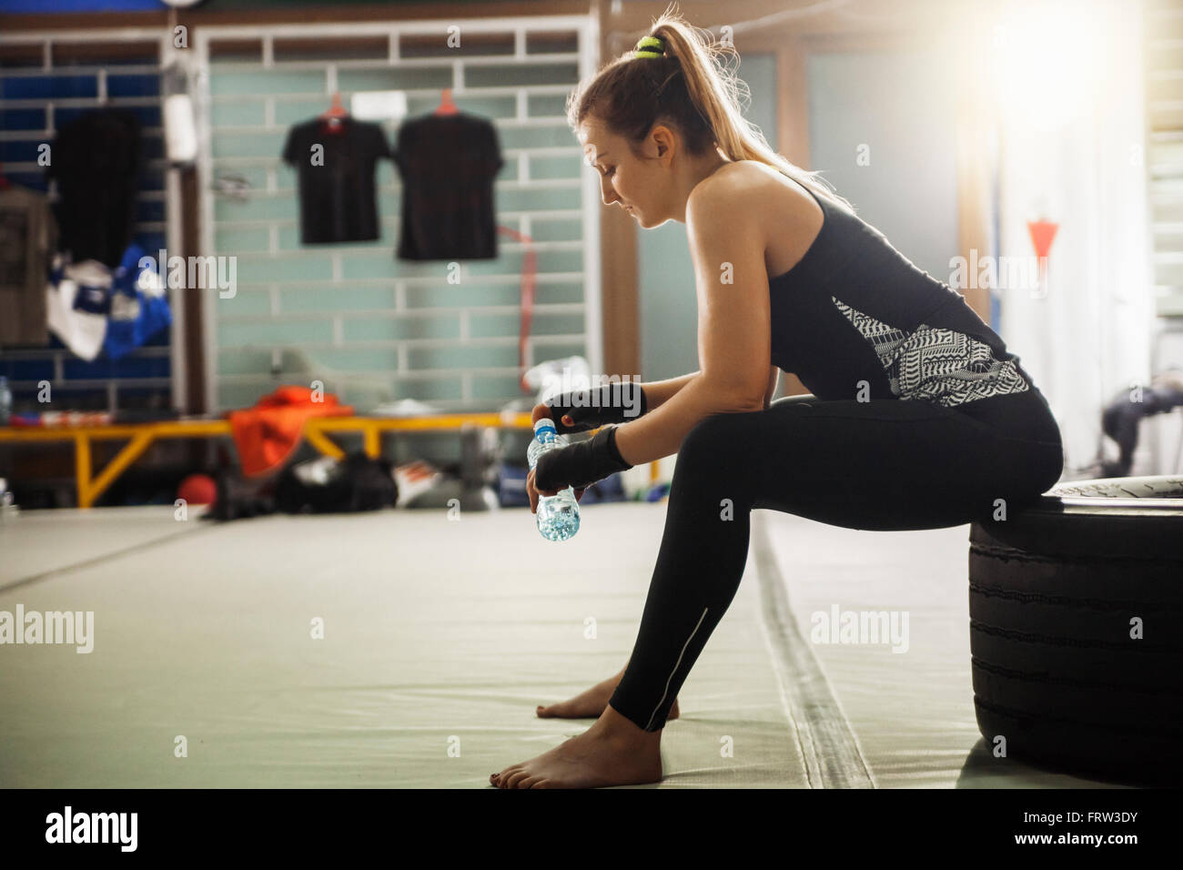 Female boxer taking a rest Stock Photo - Alamy