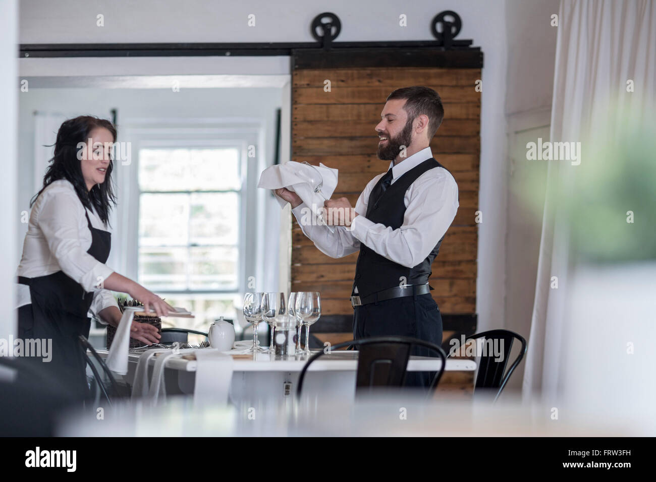 Polishing cutlery hi-res stock photography and images - Alamy