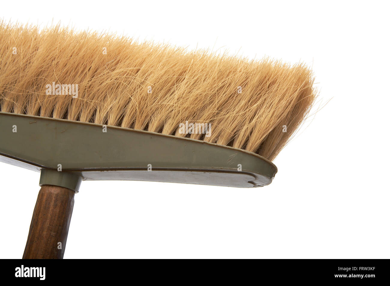 Fragment of a beautiful old mop on a white background Stock Photo - Alamy