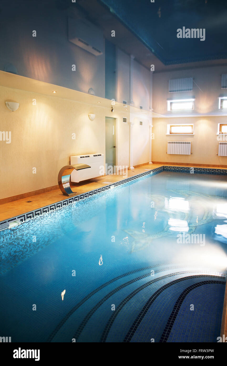 Modern pool with a mirror ceiling in luxurious hotel Stock Photo - Alamy