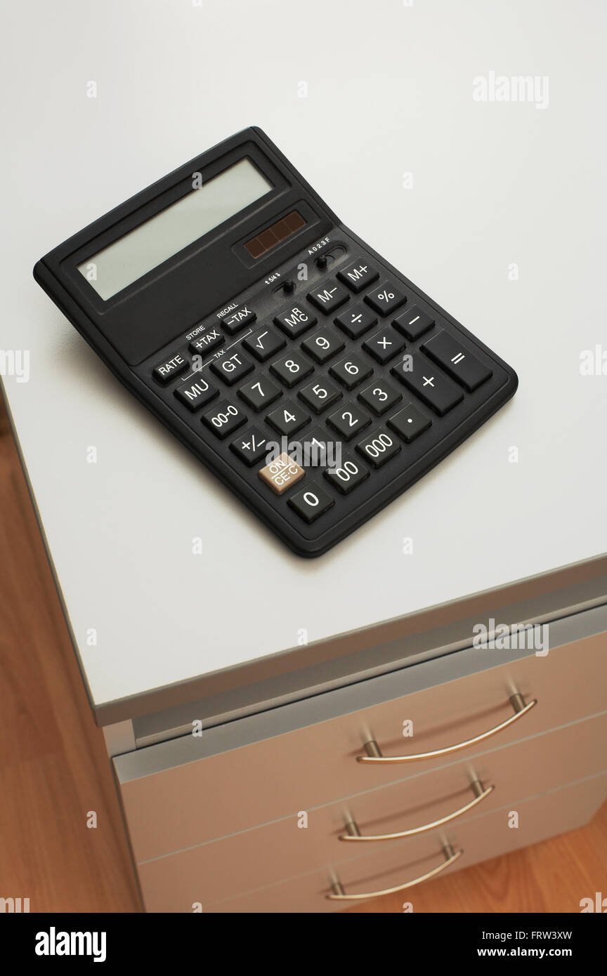 The calculator for accounting calculations on a table at office Stock ...