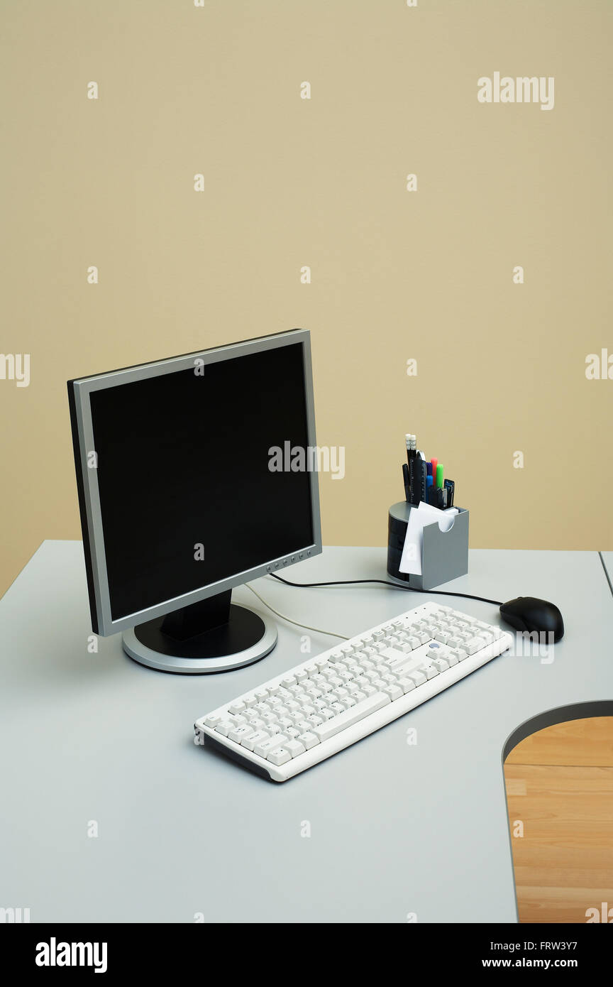 The monitor the keyboard and the mouse on a desk at office Stock Photo ...