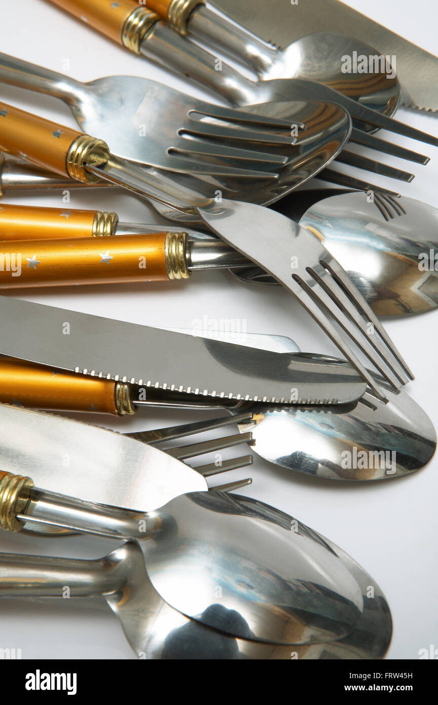 Beautiful and modern spoons, plugs and knifes Stock Photo - Alamy