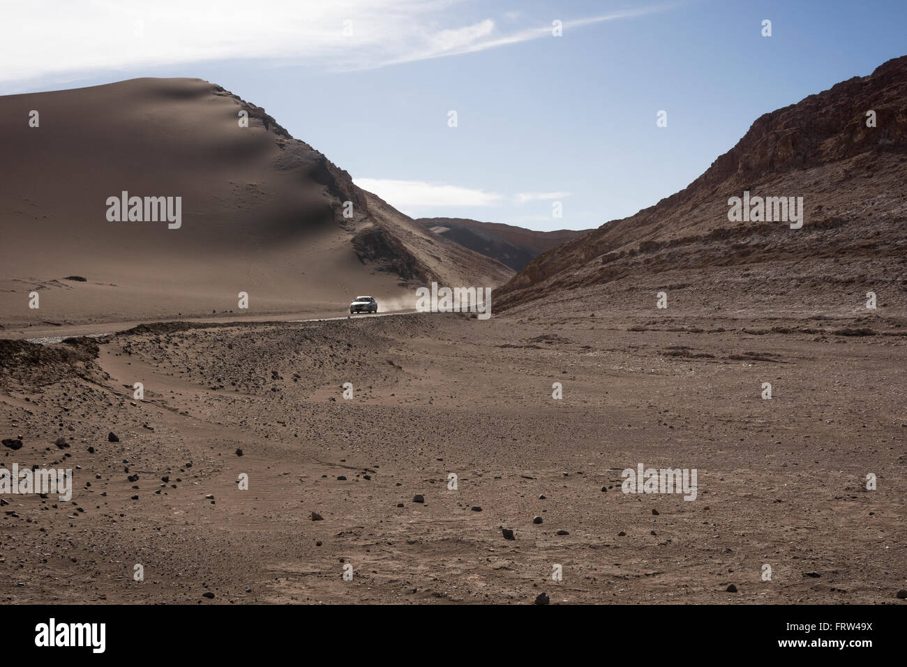 Chile, San Pedro de Atacama, car on dirt road in Atacama desert Stock ...