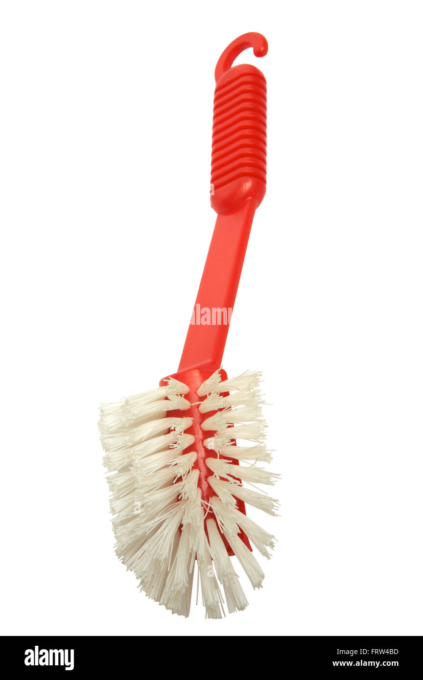 Brush for washing utensils on a white background Stock Photo - Alamy