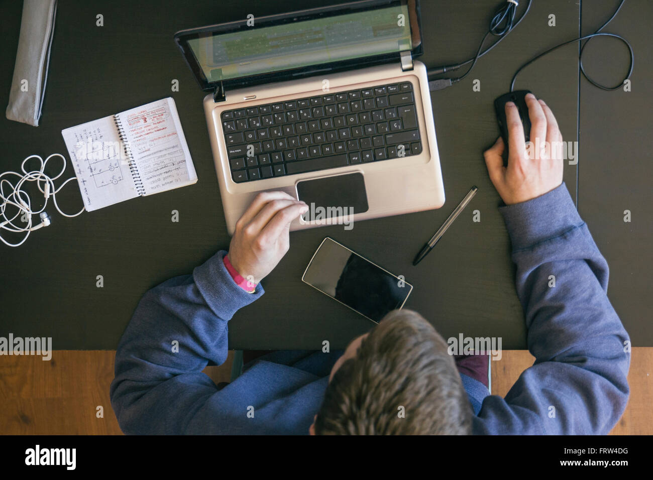 Business man using a laptop, elevated view Stock Photo - Alamy