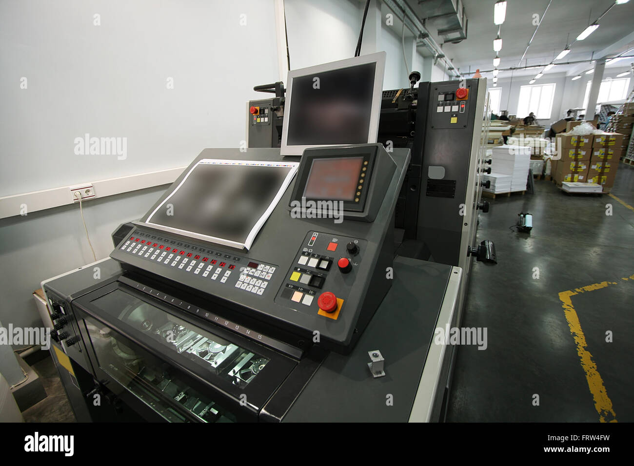 The printed equipment in shop of a modern printing house Stock Photo ...