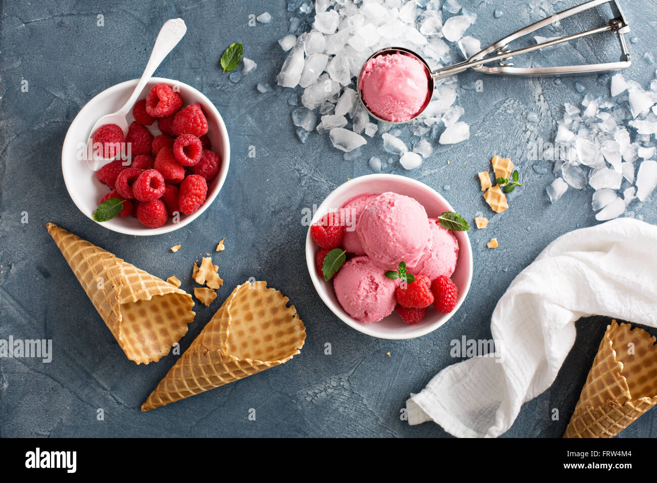 Raspberry ice cream in white bowl Stock Photo - Alamy
