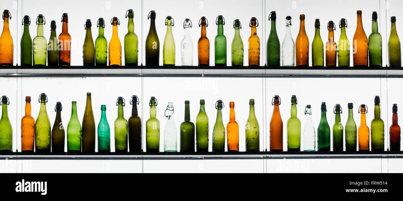 Two rows of different beer bottles Stock Photo - Alamy
