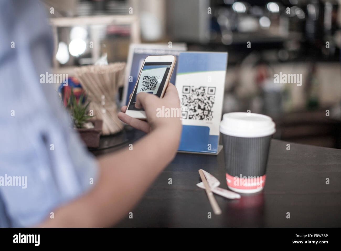 Smart phone scanning hi-res stock photography and images - Alamy