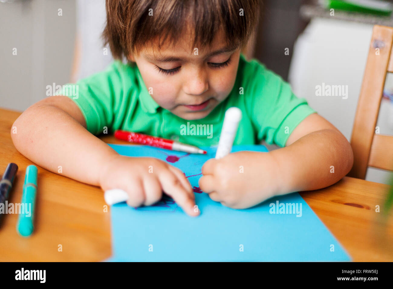 Portrait of little boy drawing Stock Photo - Alamy