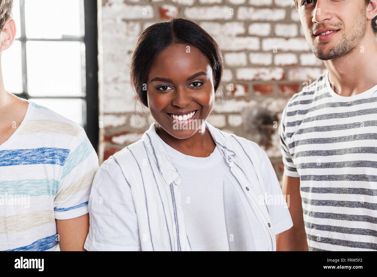 Portrait of smiling friends Stock Photo - Alamy