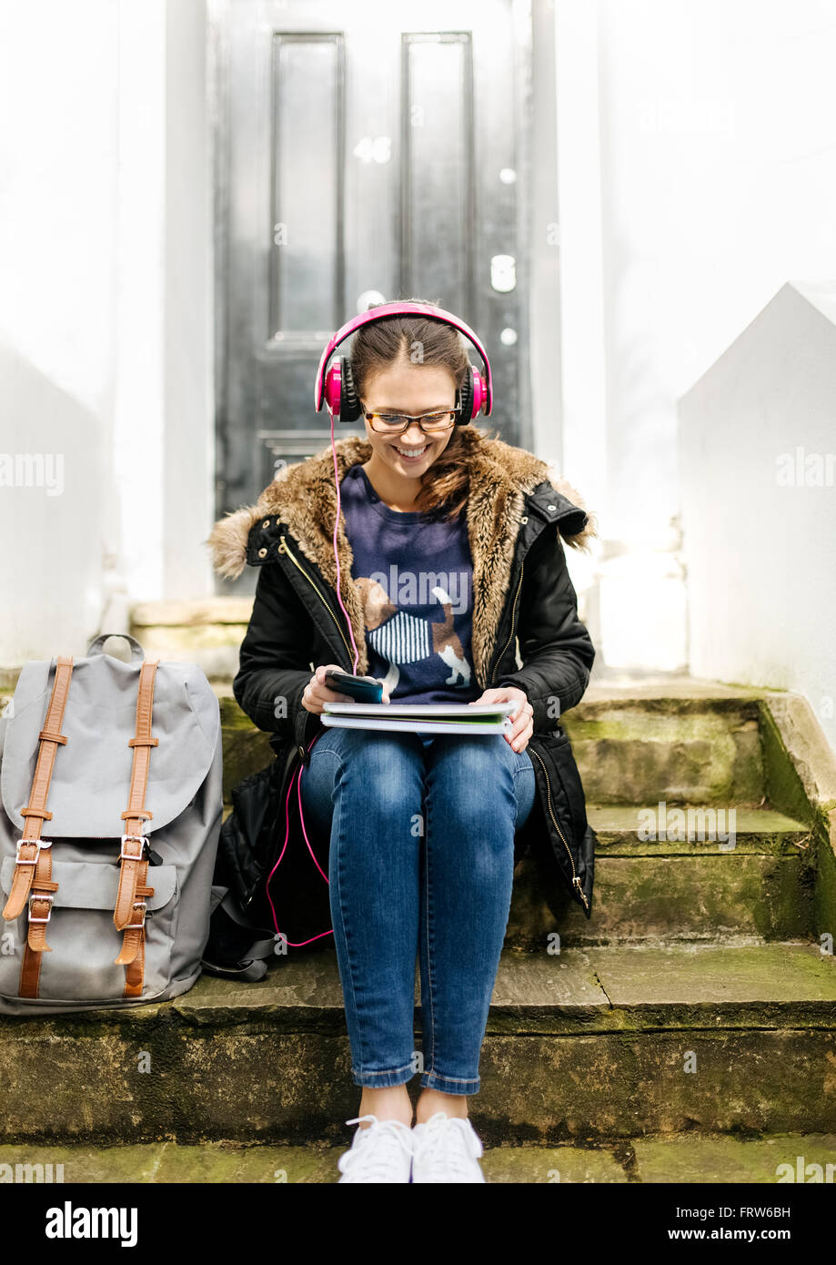 Student girl headphone writing hi-res stock photography and images - Alamy