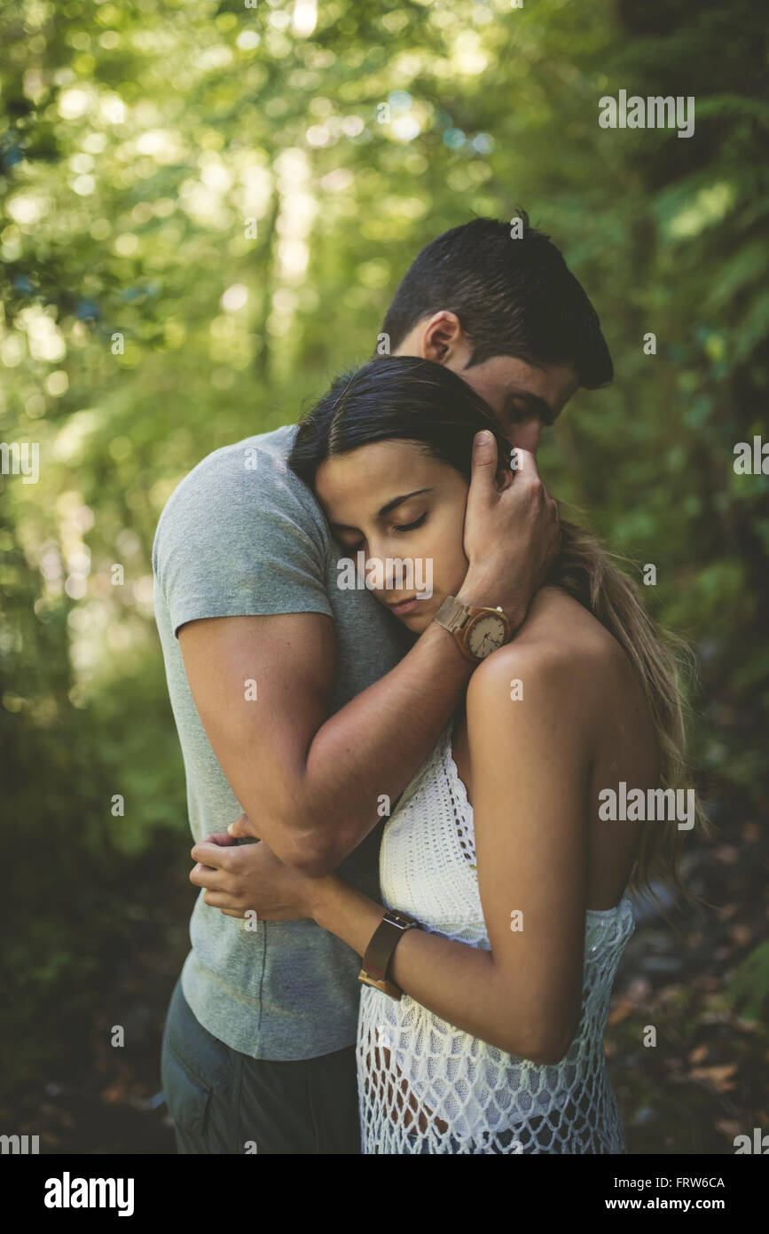 Couple in love in the forest Stock Photo - Alamy