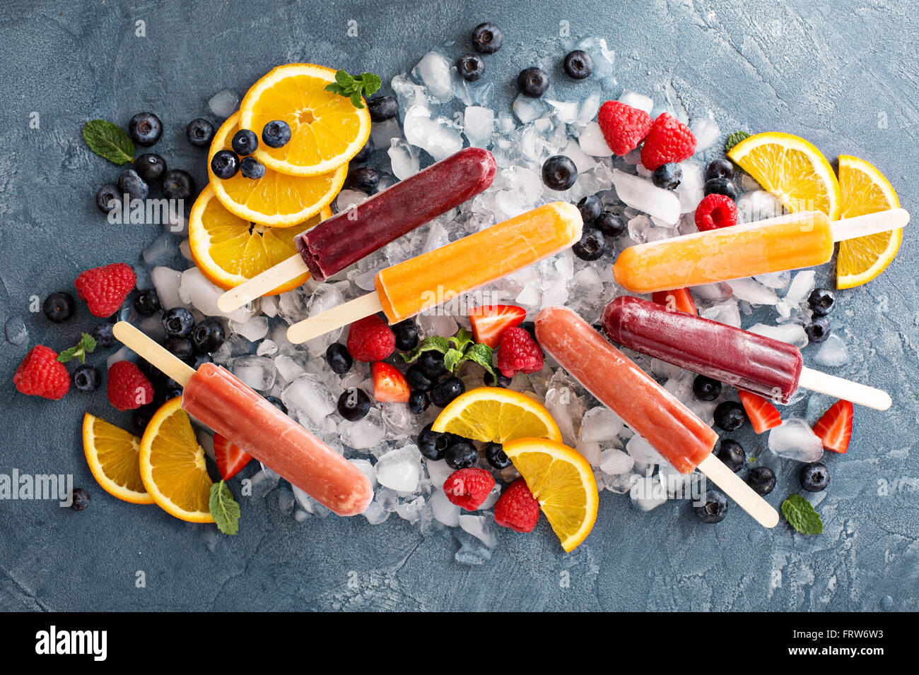 Variety of ice popsicles with fruits Stock Photo - Alamy