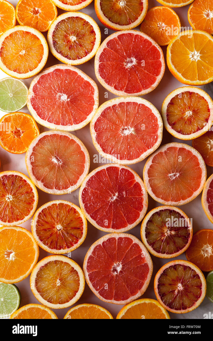 Halves of different citrus fruits Stock Photo - Alamy