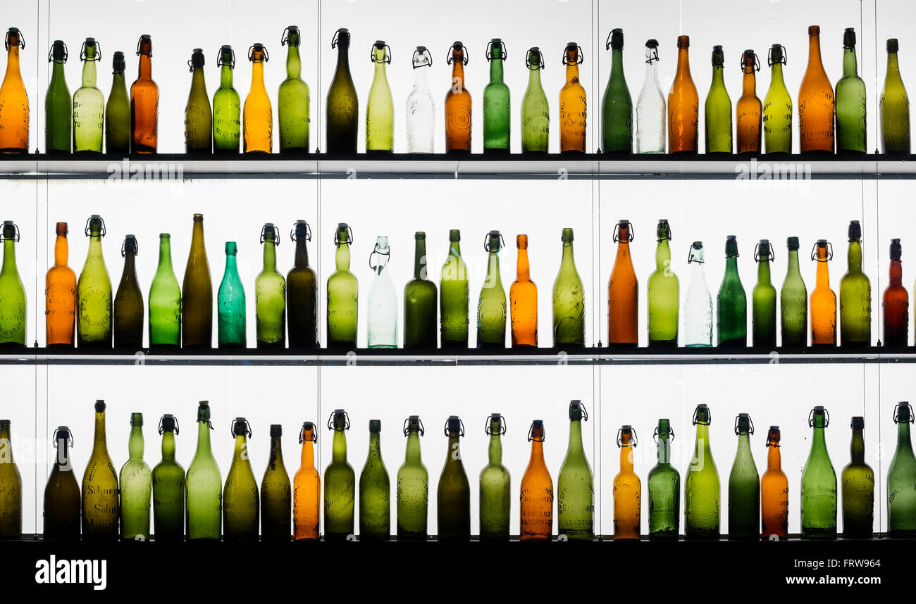 Three rows of different beer bottles Stock Photo - Alamy