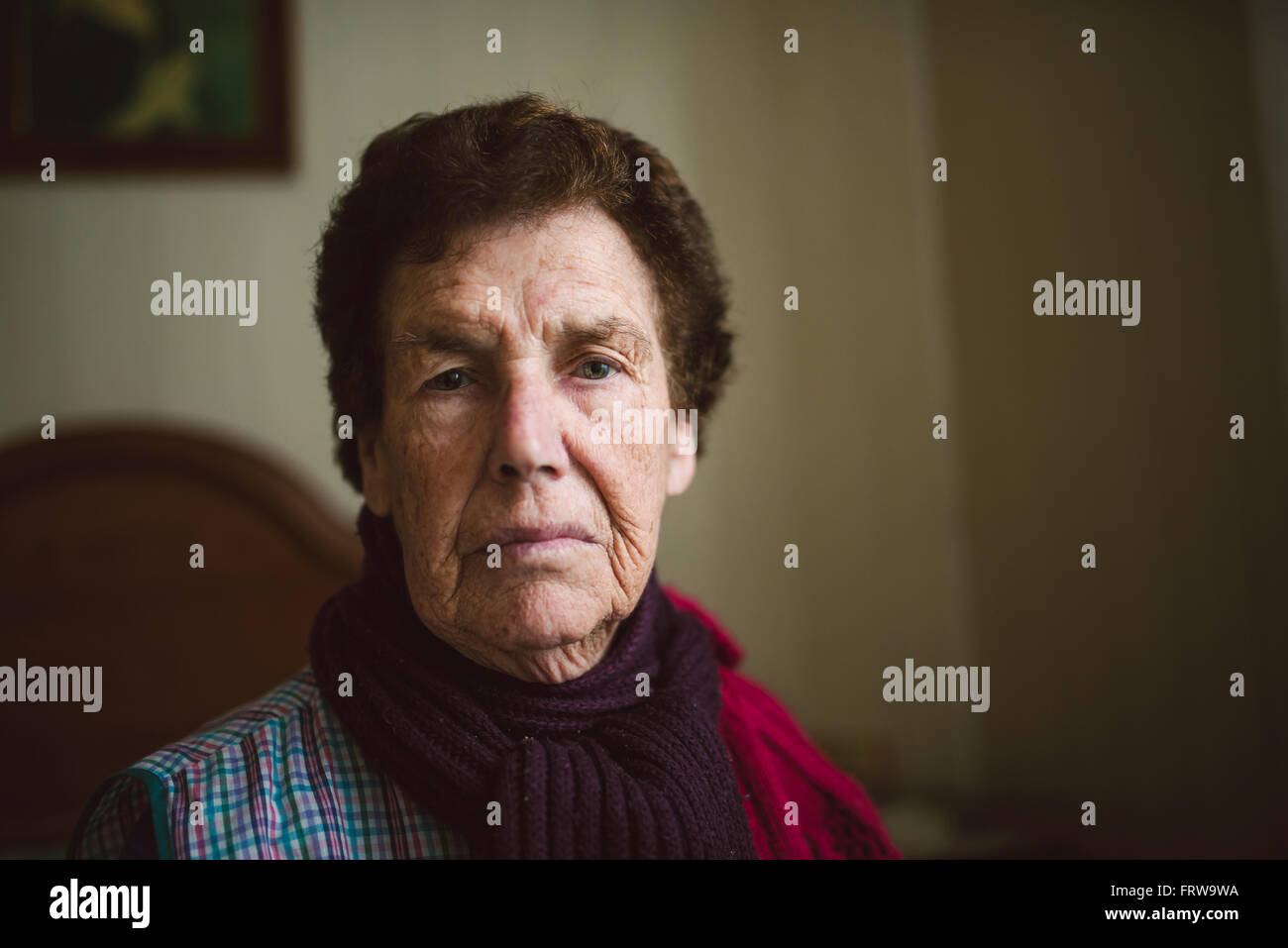 Portrait of serious looking senior woman Stock Photo - Alamy