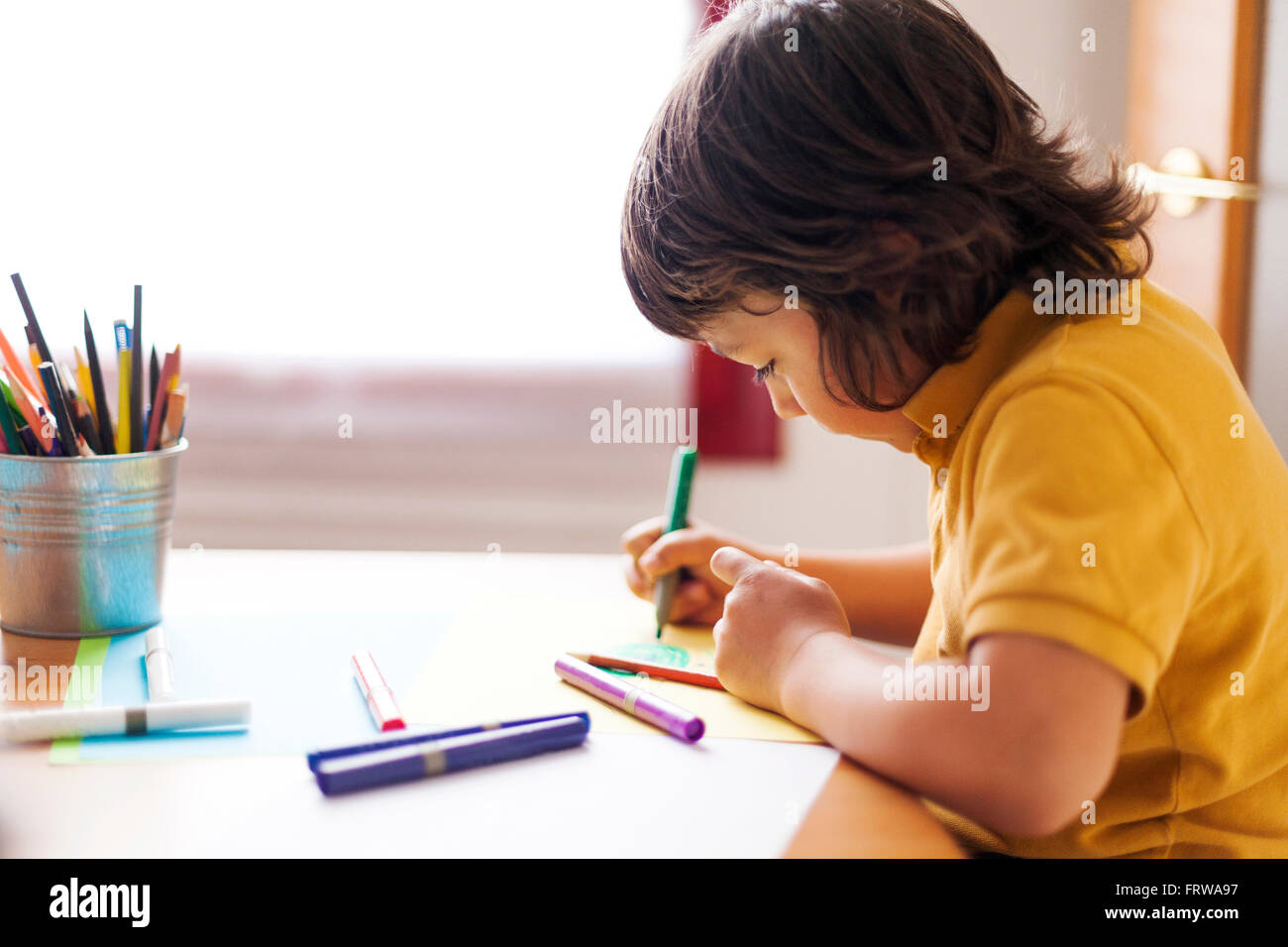 Little boy drawing Stock Photo - Alamy