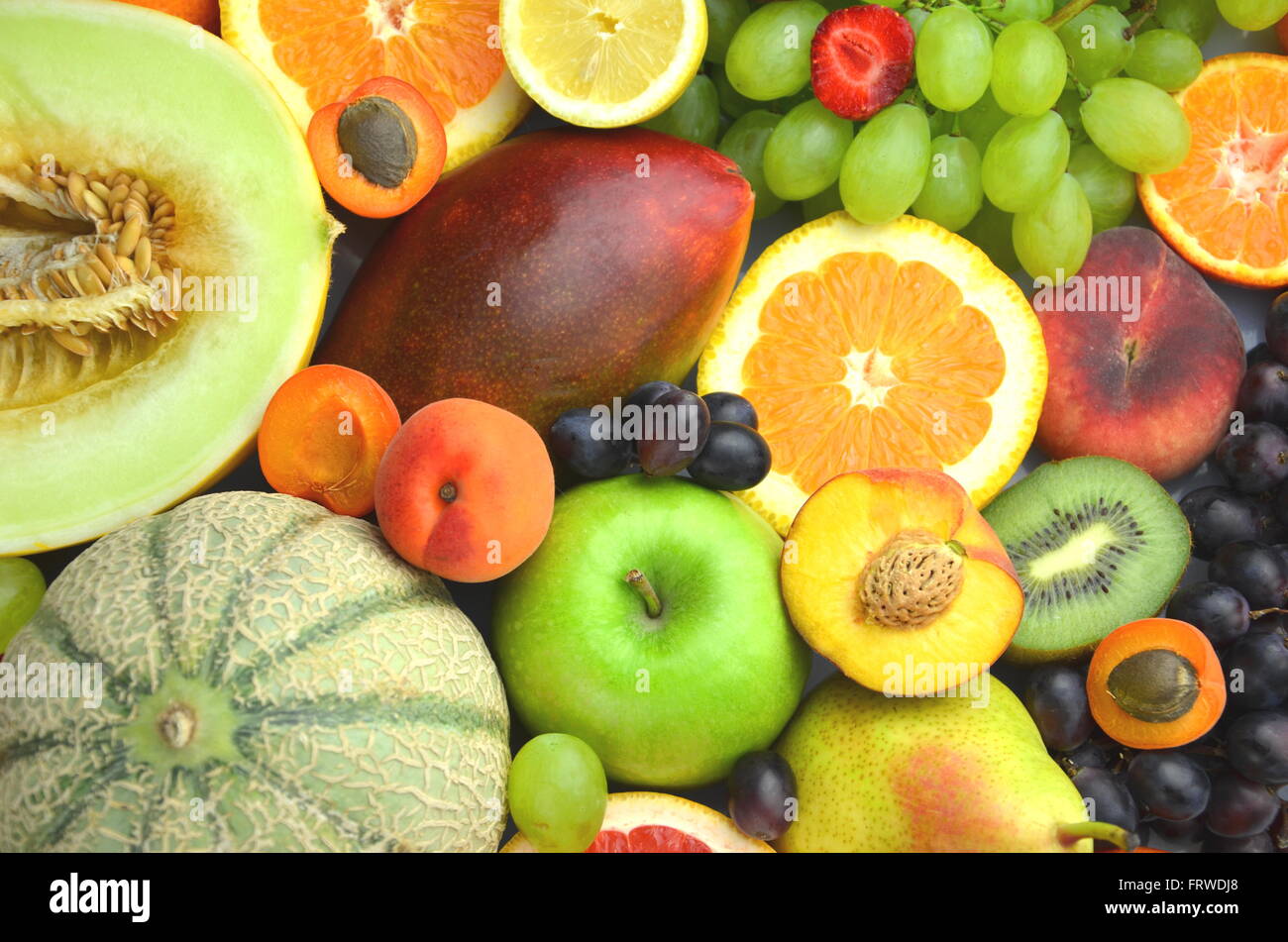 variety of fresh and delicious fruits on the table Stock Photo - Alamy
