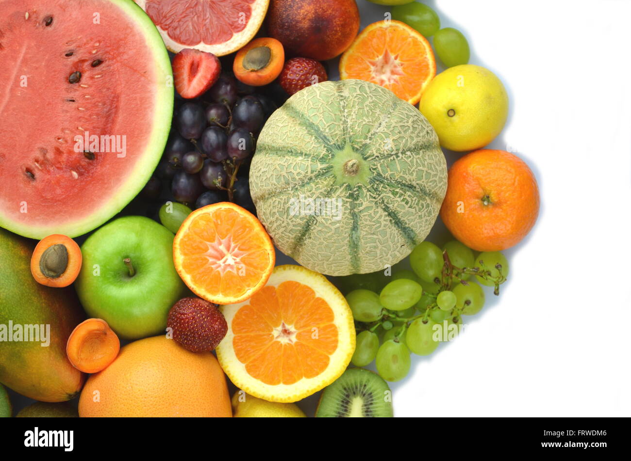 Variety of fresh and delicious fruits isolated on white Stock Photo - Alamy