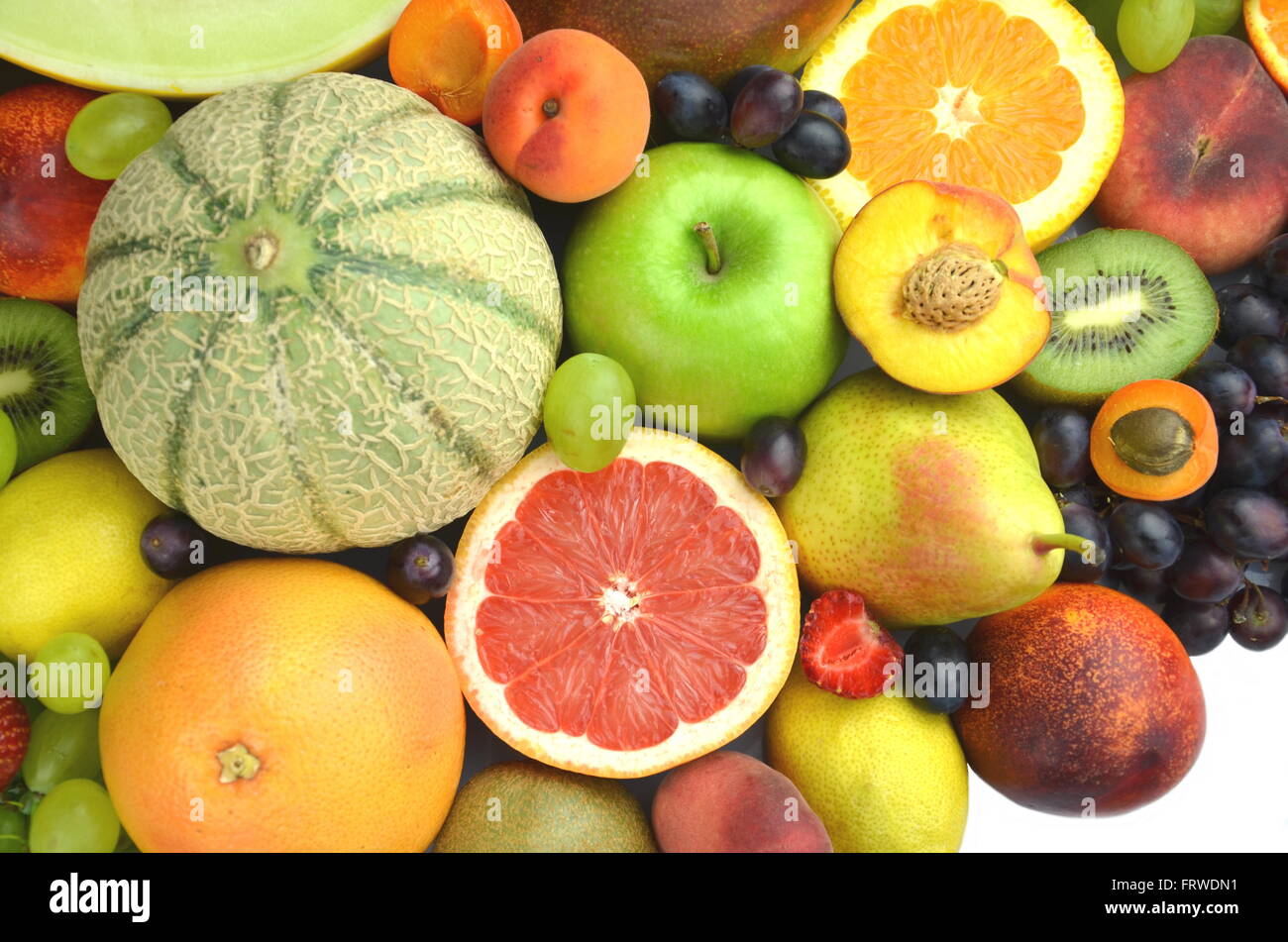 Variety of fresh and delicious fruits isolated on white Stock Photo - Alamy